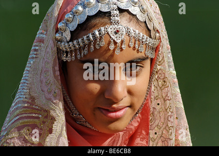 Young omani child girl in traditional clothing, Ad Dakhiliyah Region ...