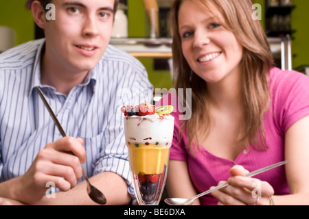 Couple sharing ice cream sundae Stock Photo - Alamy