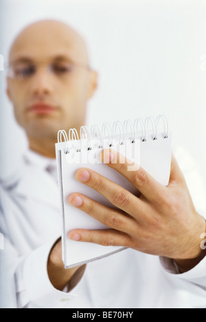 Researcher taking notes Stock Photo - Alamy