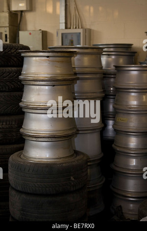 A stack of car alloy wheels and tyres Stock Photo - Alamy