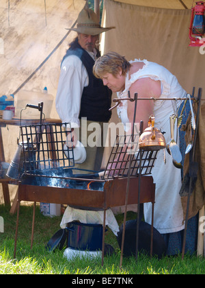 Cowboy cooking over an open fire Stock Photo - Alamy