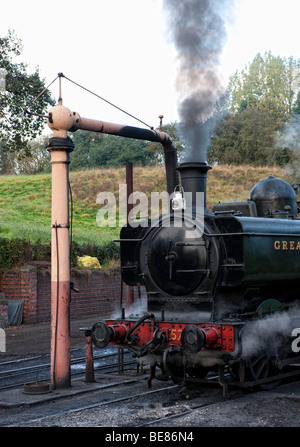 Ex-GWR 0-6-0 pannier tank steam loco 7714 on the turntable at Minehead ...