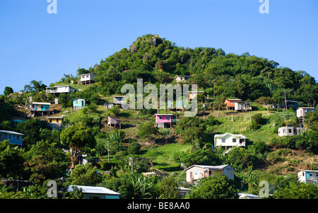 Countryside housing on the caribbean island of Grenada, blue wooden ...
