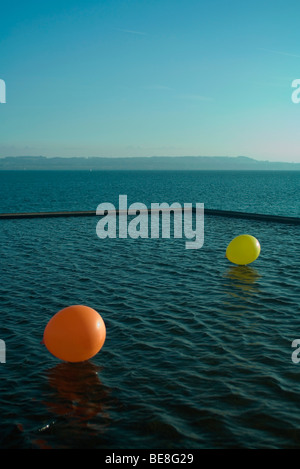Two balloons floating on water Stock Photo: 26013868 - Alamy