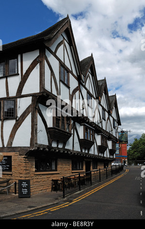 View of old half-timbered restaurants and hotels along La Lauch at ...