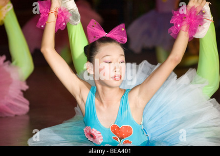 Chinese kids performing ballet dance during 60th Anniversary of ...