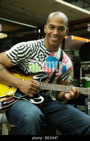 African Guitarist Posing Stock Photo - Alamy