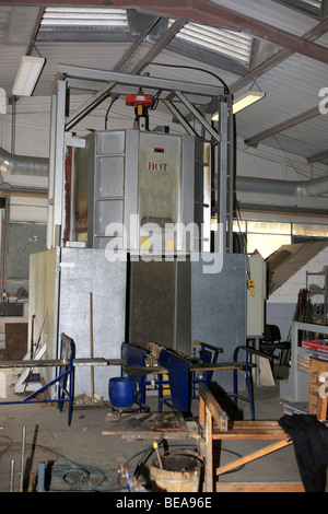 Glass factory, workshop with blast furnaces and crane Stock Photo - Alamy