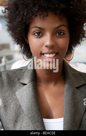 Beautiful young african business woman posing isolated over white Stock ...