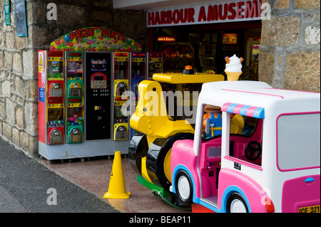 children's rides at an amusement arcade Stock Photo - Alamy