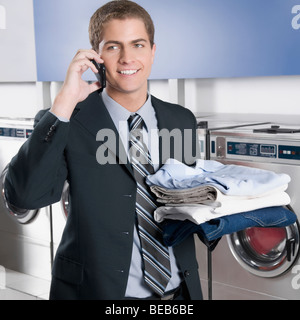 Smiling businessman talking in his mobile phone Stock Photo - Alamy