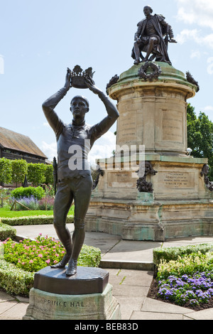 A statue of William Shakespeare's Prince Hal lifts a crown above his ...