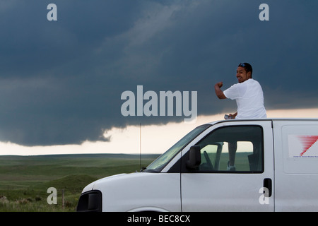 Project Vortex 2 participant and storm chaser Dennis Sherrod stands by ...