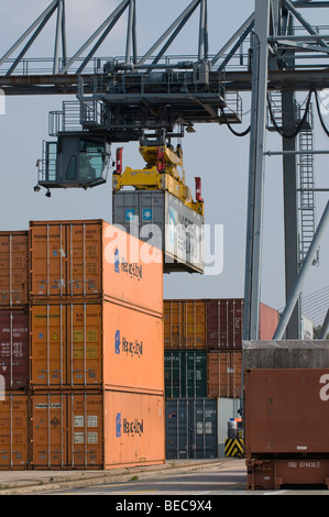 Bonn Container Terminal, gantry crane lifting a container, bimodal ...