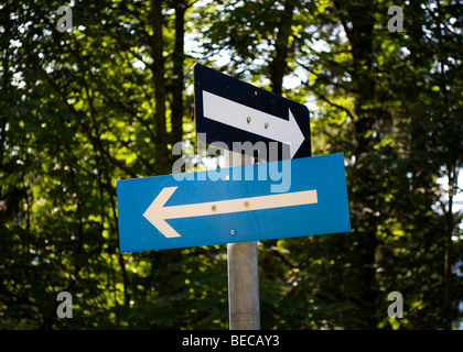 Blue Sign with two Arrows - Two directions on a blue road sign , Part ...