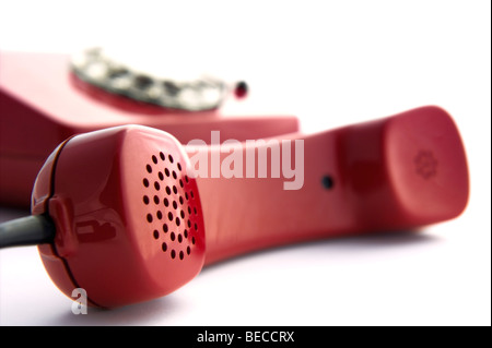 A studio photo of a red rotary telephone Stock Photo - Alamy