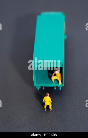 Top view of miniature toys figurines football (soccer) players on a ...