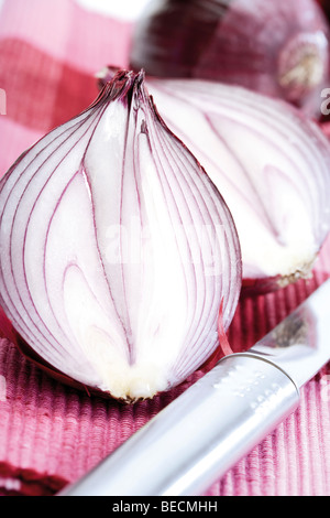 "Red onions" split in half on "neutral background Stock Photo - Alamy