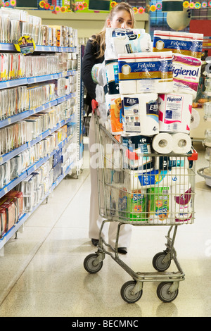 Rolls of White Toilet Paper over Gray Background. Copy Space for text ...