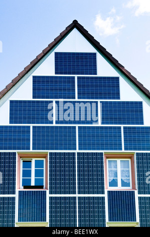 solar power solar panels at facade of apartment building Stock Photo ...