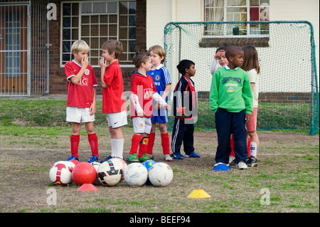 Children practice during a soccer training session. in Tehran, Iran ...
