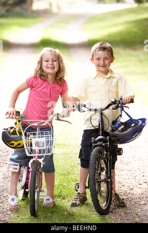 Children riding bikes in countryside Stock Photo - Alamy