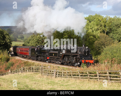 A double header, two steam locomotives pulling together on the The ...
