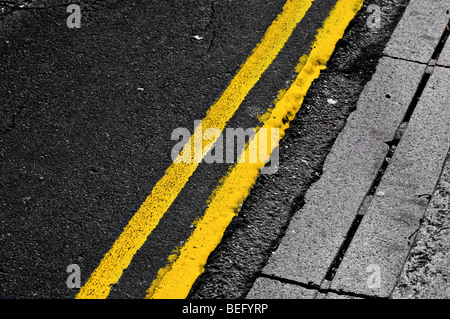 double yellow lines road and no loading kerb pavement markings in ...