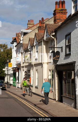 Shoppers and shops at the High Street Huntingdon Cambridgeshire UK ...