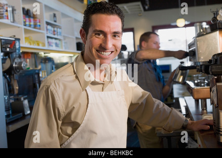 Portrait of male coffee store clerk Stock Photo - Alamy