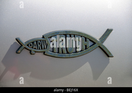 Bumper sticker: Truth fish eats Darwin fish with legs Stock Photo - Alamy