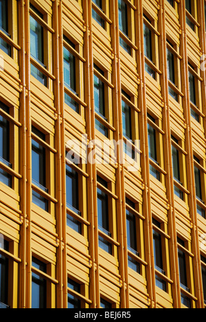 Modern office building facade close-up with minimalist vertical frames ...
