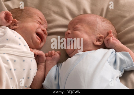 Babies crying, premature identical twin boys Stock Photo - Alamy
