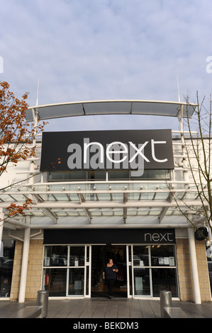 Next store sign logo Stock Photo - Alamy
