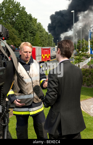 interview with firefighter Stock Photo - Alamy