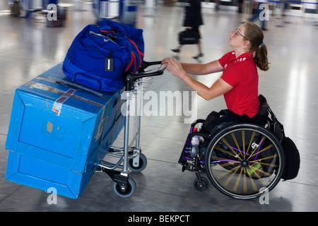 Disabled passenger at Heathrow Airport Stock Photo - Alamy