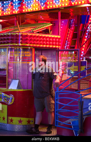 Illuminated funhouse at night at Midsummer Fair Cambridge Stock Photo ...