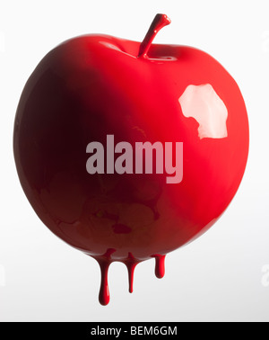 Apple dripping with color Stock Photo - Alamy