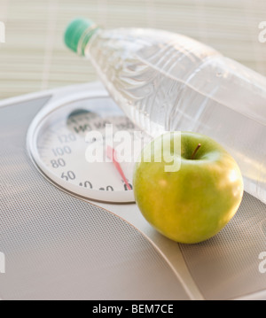 a scale and a water bottle Stock Photo - Alamy