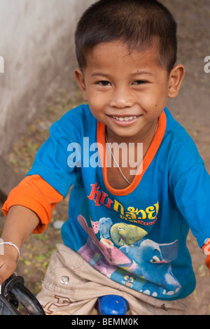 naked Lao boy playing on Don Khon Island in Laos Stock Photo - Alamy