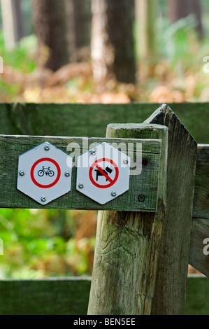 Prohibition signs in a park Stock Photo - Alamy