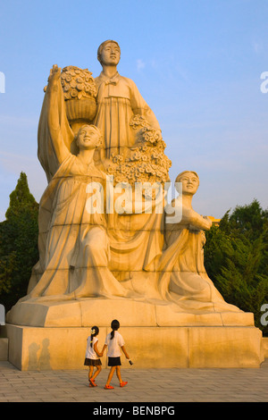 Statues around Tower of Juche Idea, Pyongyang, North Korea Stock Photo ...