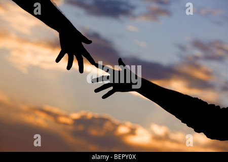 Hand reaching out or pulling away Stock Photo - Alamy