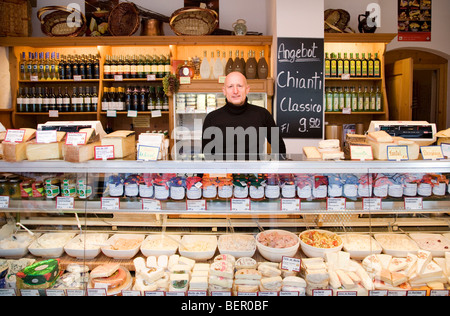 cheese, wine store owner in shop Stock Photo - Alamy