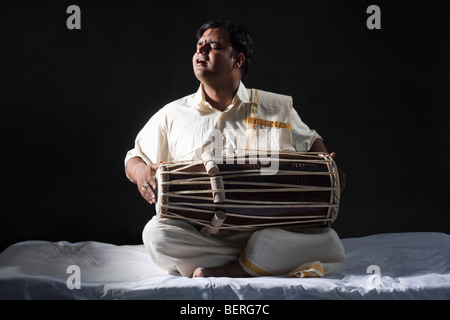 Man playing the tabla Stock Photo - Alamy