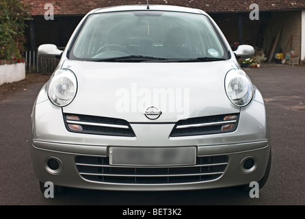 Nissan Micra Spirita small saloon car side view Stock Photo - Alamy