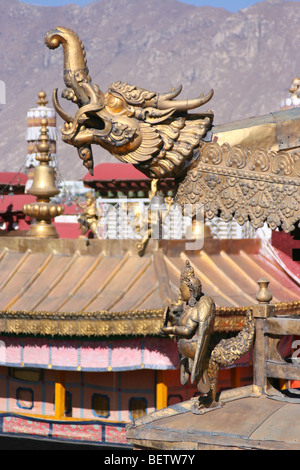 Gilded bronze roofs of the Jokhang Temple in Lhasa, Tibet. Included in ...