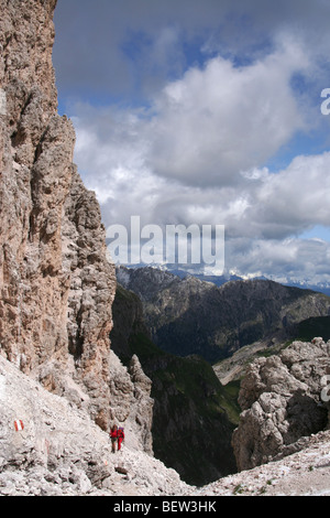 Walkers arriving at Forcella della Foa, Italian Dolomites summer Stock ...