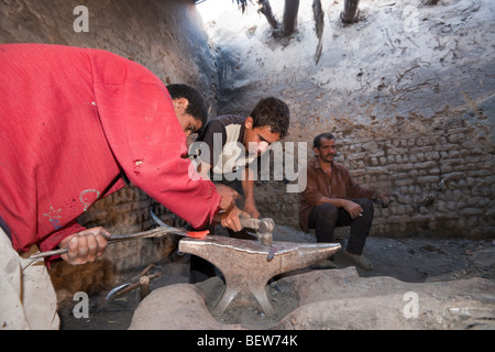 Blacksmith at work, Dakhla Oasis, Libyan Desert, Egypt Stock Photo - Alamy
