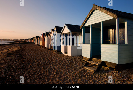 Beach huts on the stoney beach at Shoeburyness in the late autumn ...